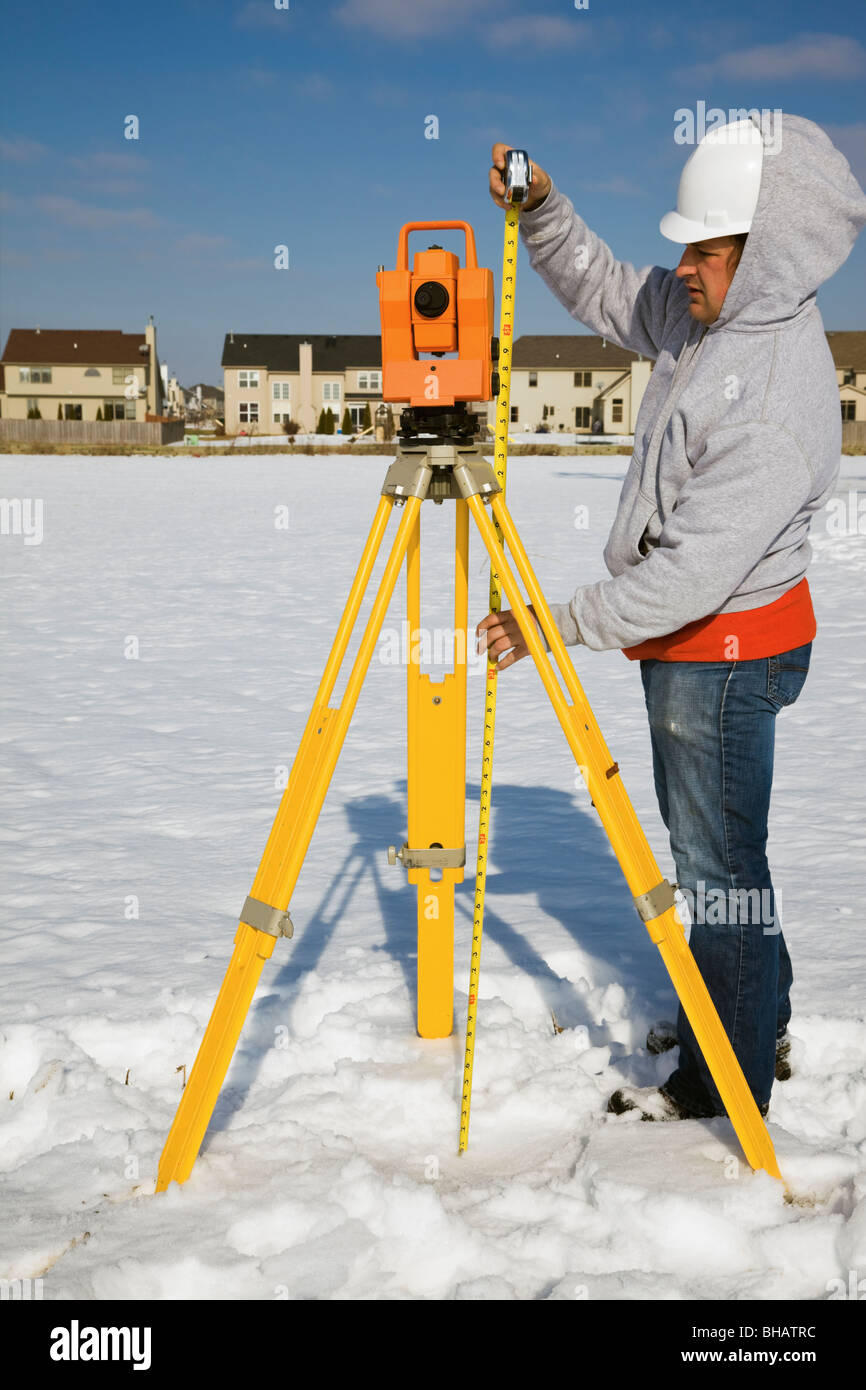 Measuring height of theodolite Stock Photo - Alamy