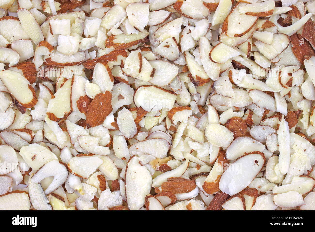 Close view of sliced almonds Stock Photo - Alamy