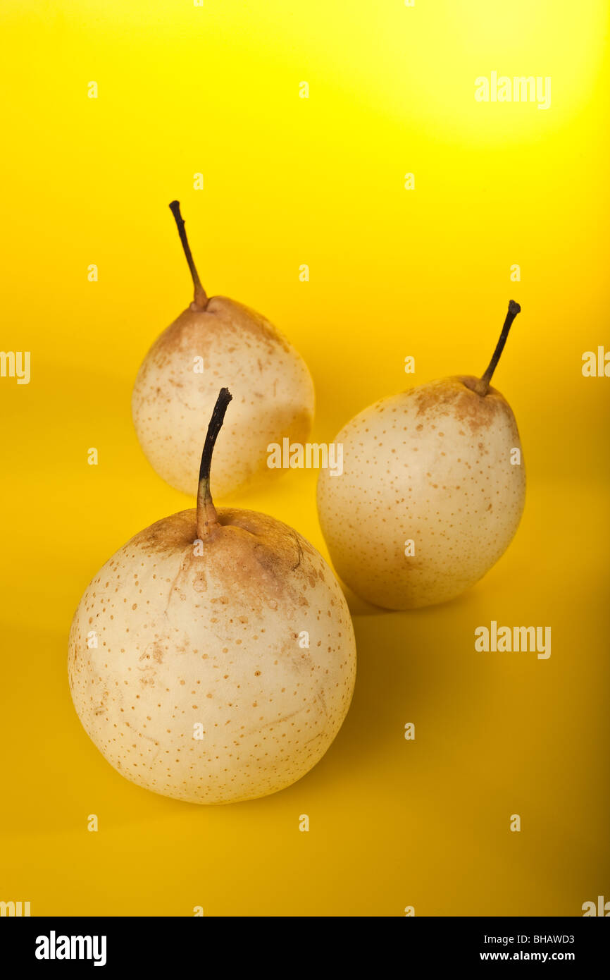 Fruit photographed on a yellow background with a gradient Stock Photo ...