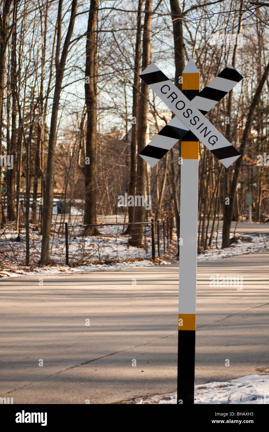 A sign cautioning people that it is a crossing for both pedestrians and ...