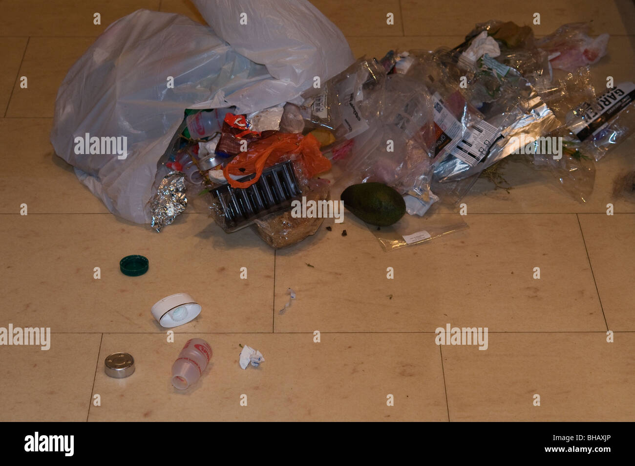 Split rubbish bag Stock Photo - Alamy