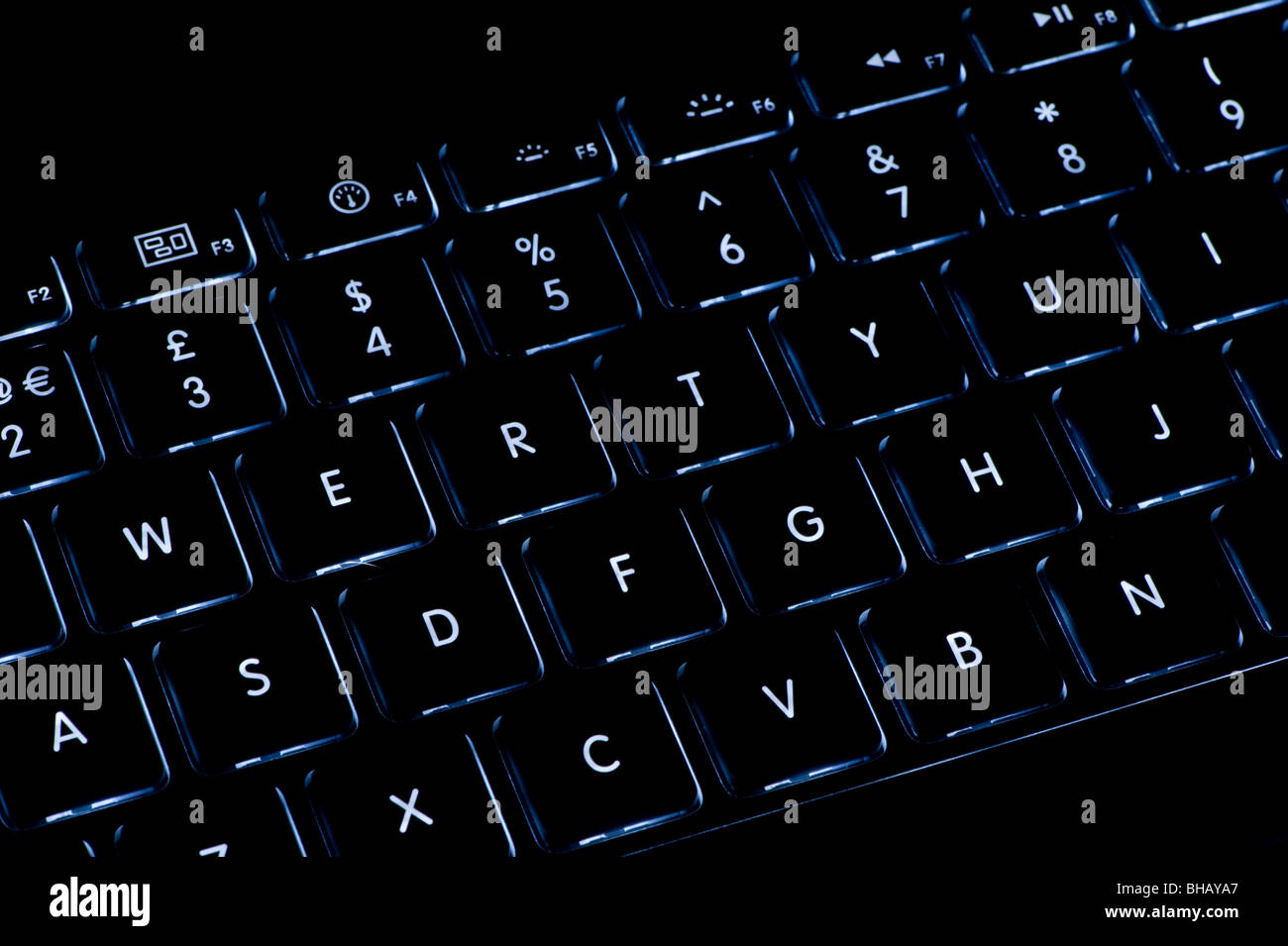 Illuminated laptop keyboard (APPLE Stock Photo - Alamy