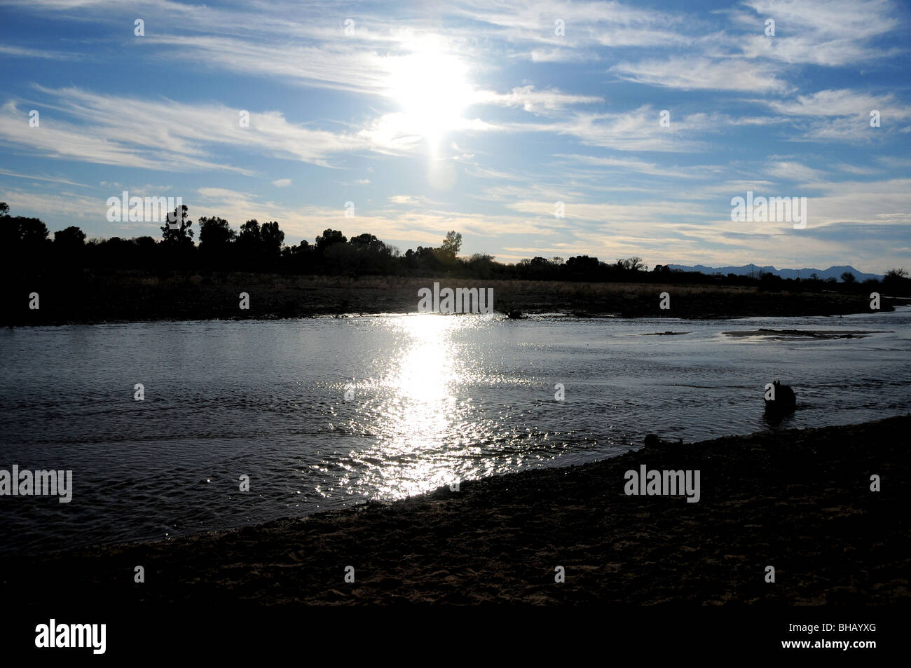 Water flows seasonally in the Rillito River in the Sonoran Desert ...