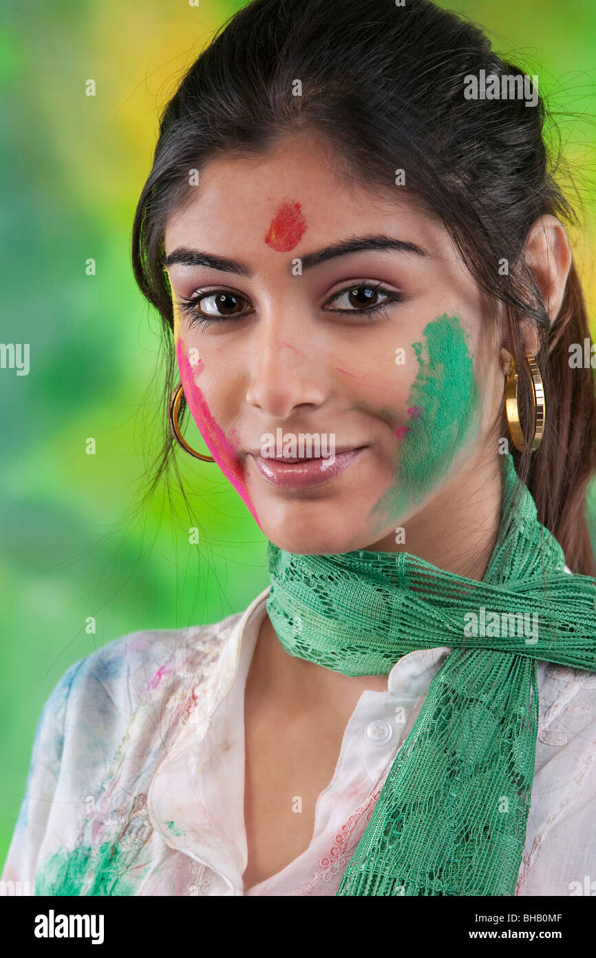 Portrait of a woman with colour on her face Stock Photo - Alamy