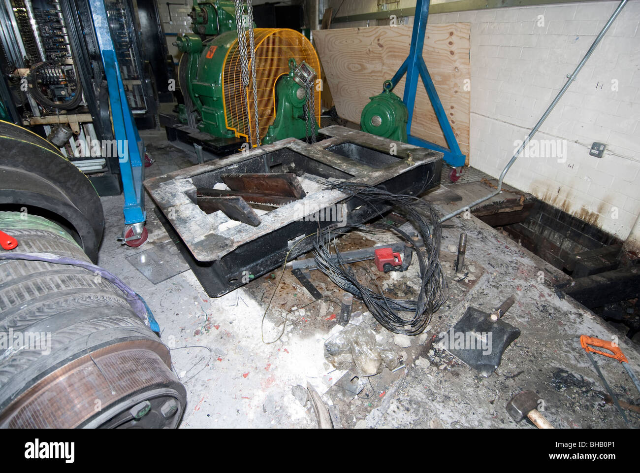Fire in lift motor room showing burnt joists and motors Stock Photo - Alamy