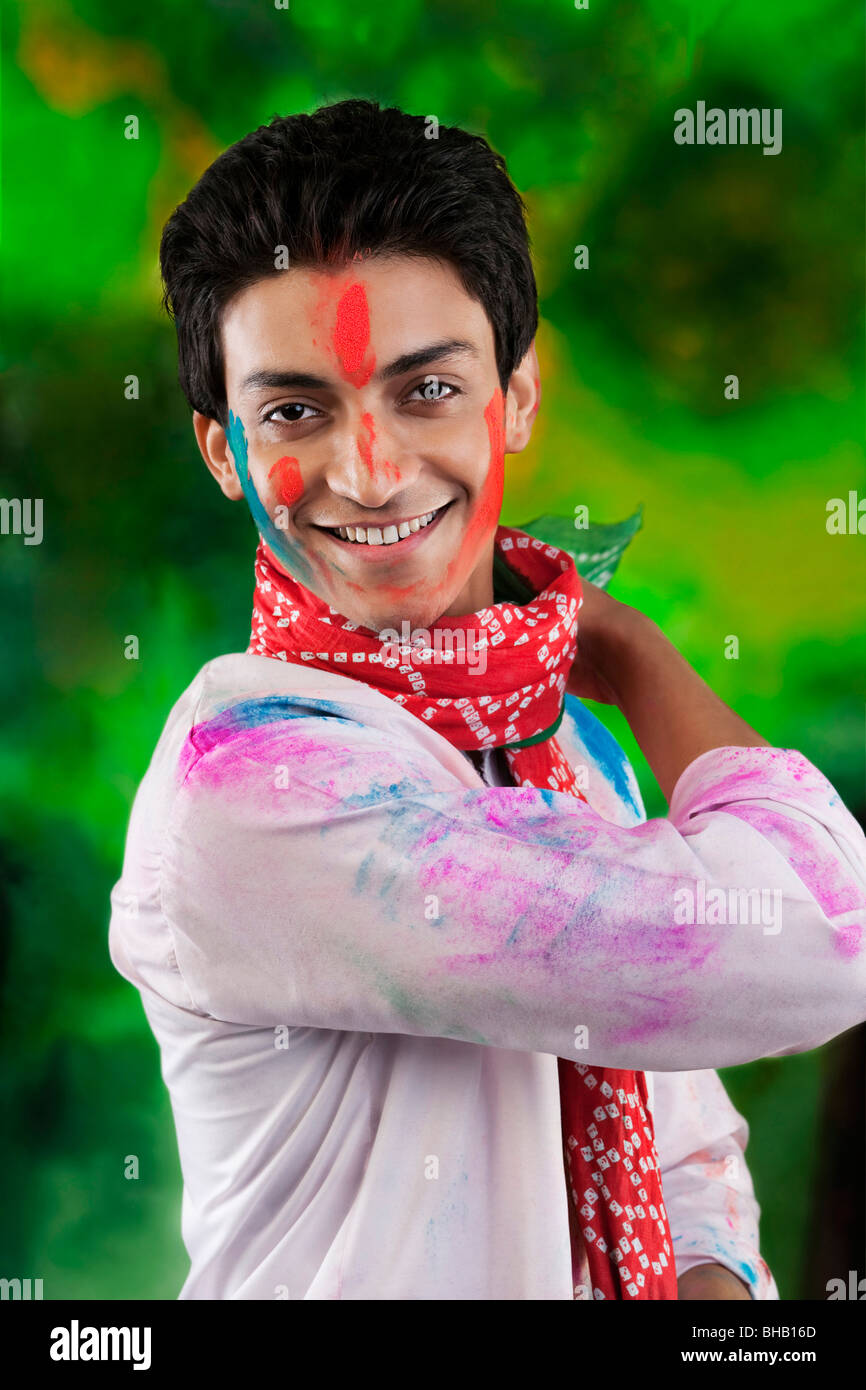 Portrait of a man with colour on his face Stock Photo - Alamy