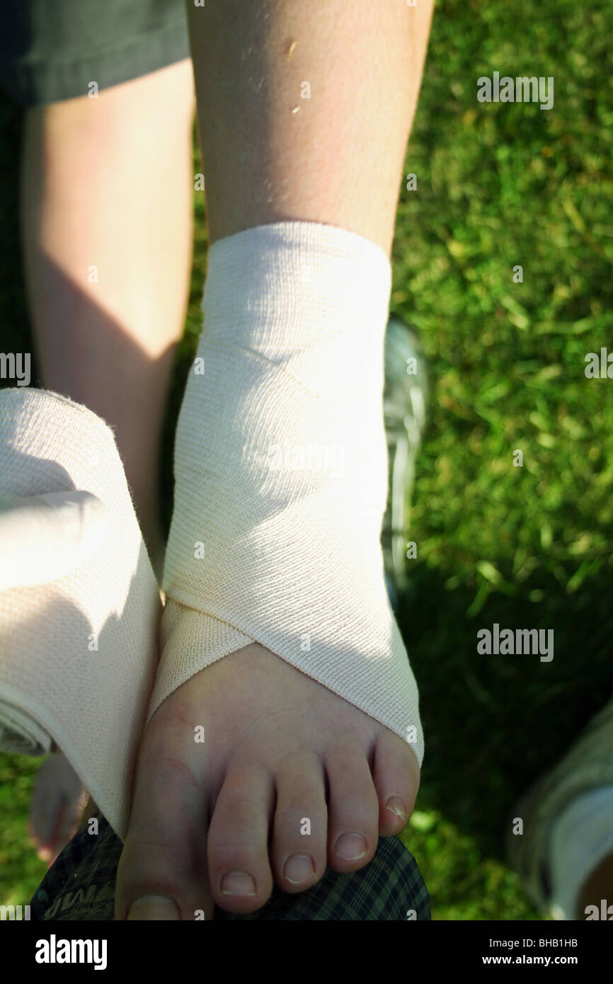Youth footballers ankle in Ace bandage Stock Photo - Alamy