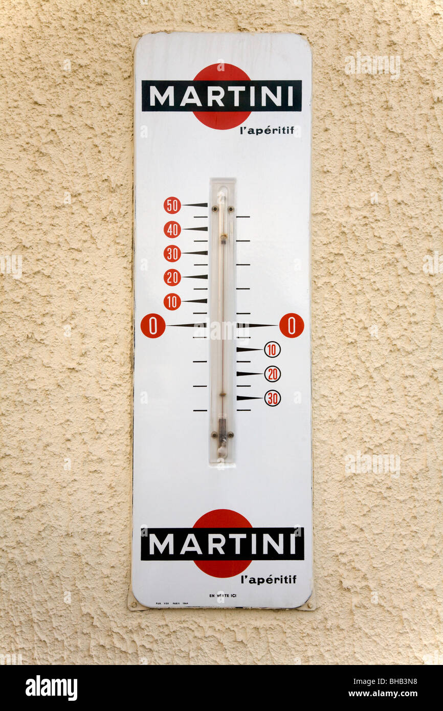 Martini thermometer on a cafe / bar wall in Bourdeau: a town on the ...