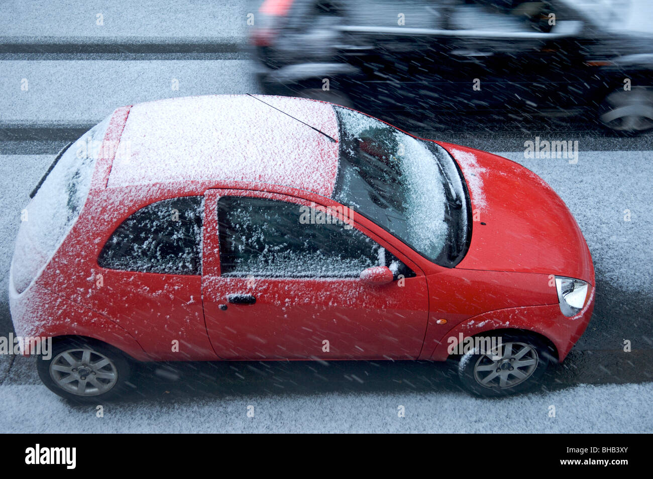 Red car parked in hi-res stock photography and images - Alamy