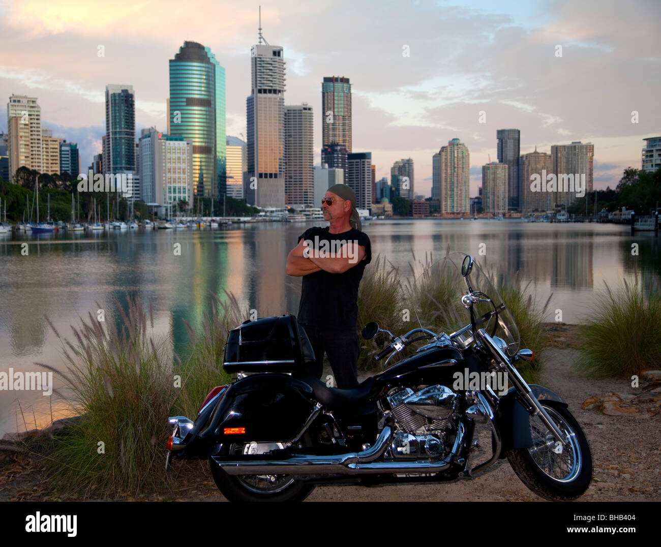 Bike rider with city background Stock Photo - Alamy