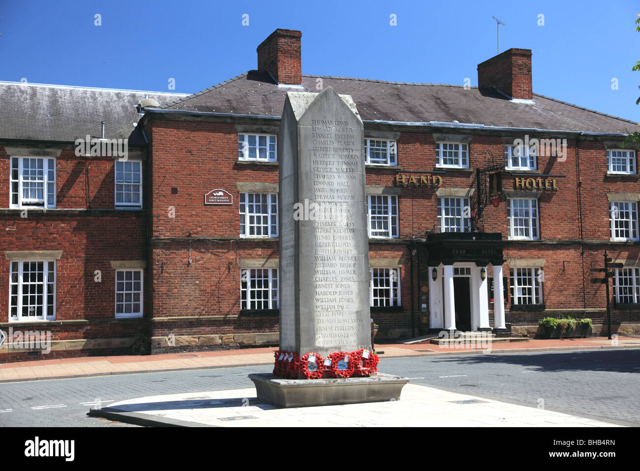 The war memorial in Chirk, North Wales, by Eric Gill, erected in 1920 ...