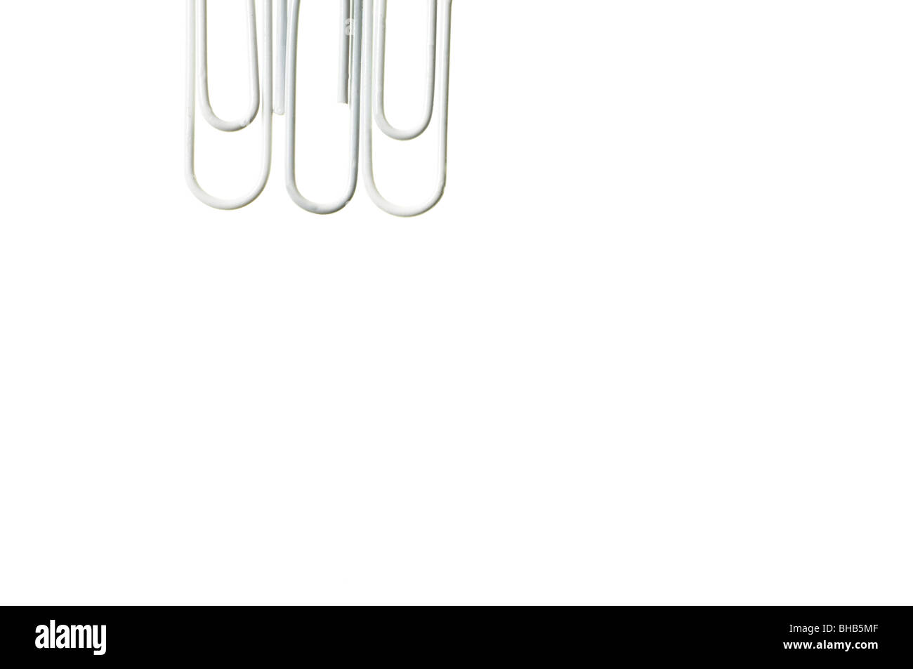 Paper clip on white background Stock Photo - Alamy