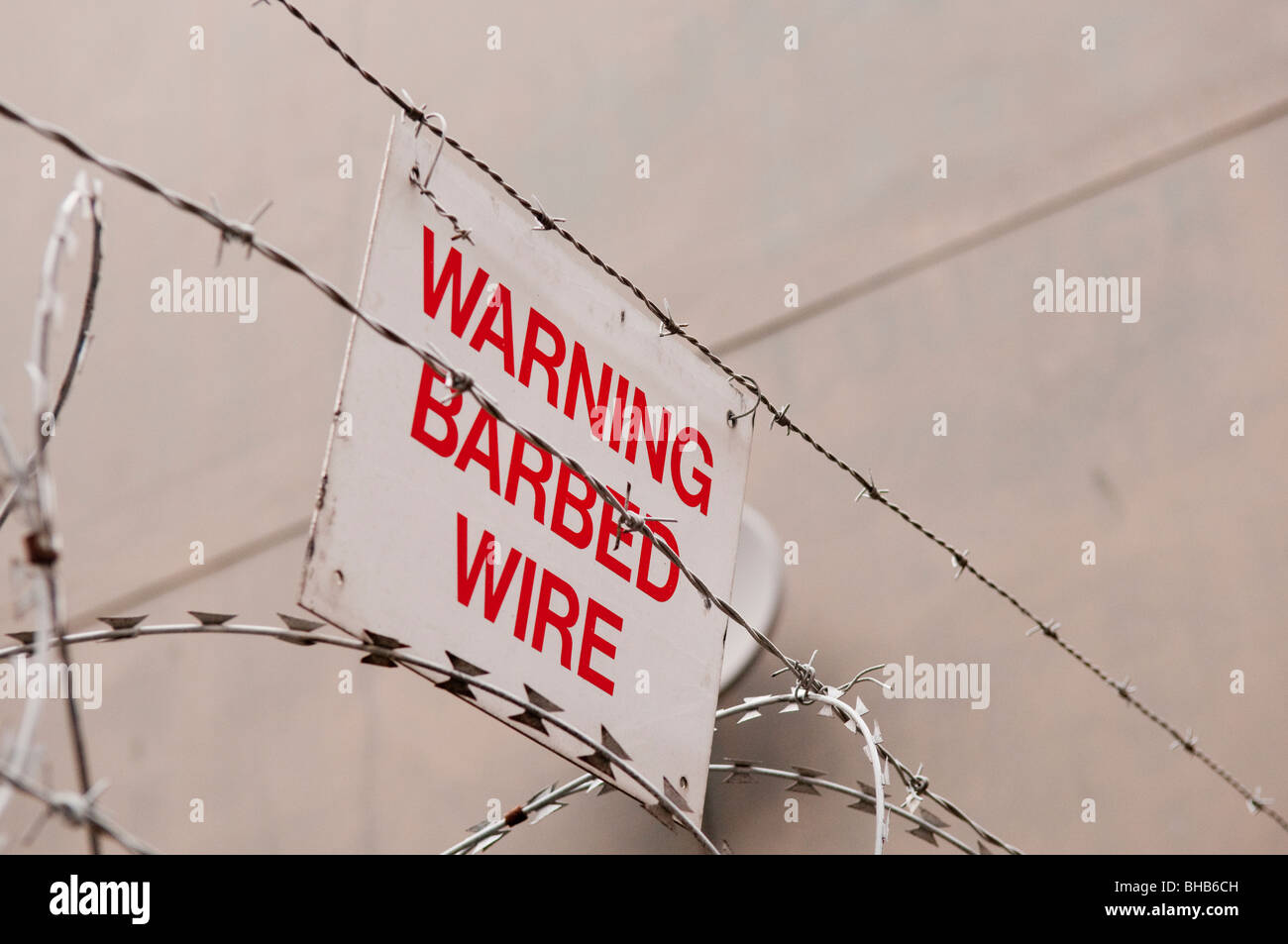 Barbed Wire On Wall High Resolution Stock Photography and Images - Alamy