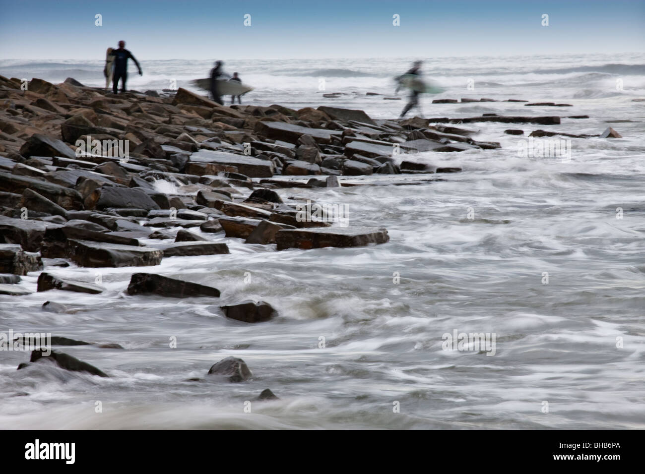 Surfers at Kimmeridge on the Dorset Jurassic Coast Stock Photo - Alamy