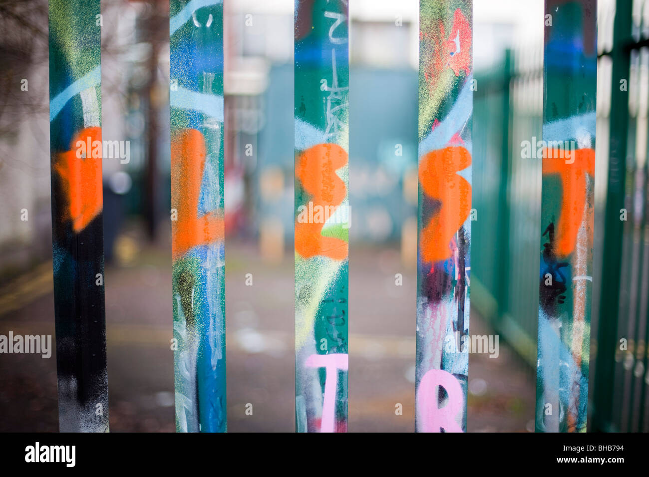 Urban fence that has been spray painted in graffiti style Stock Photo ...