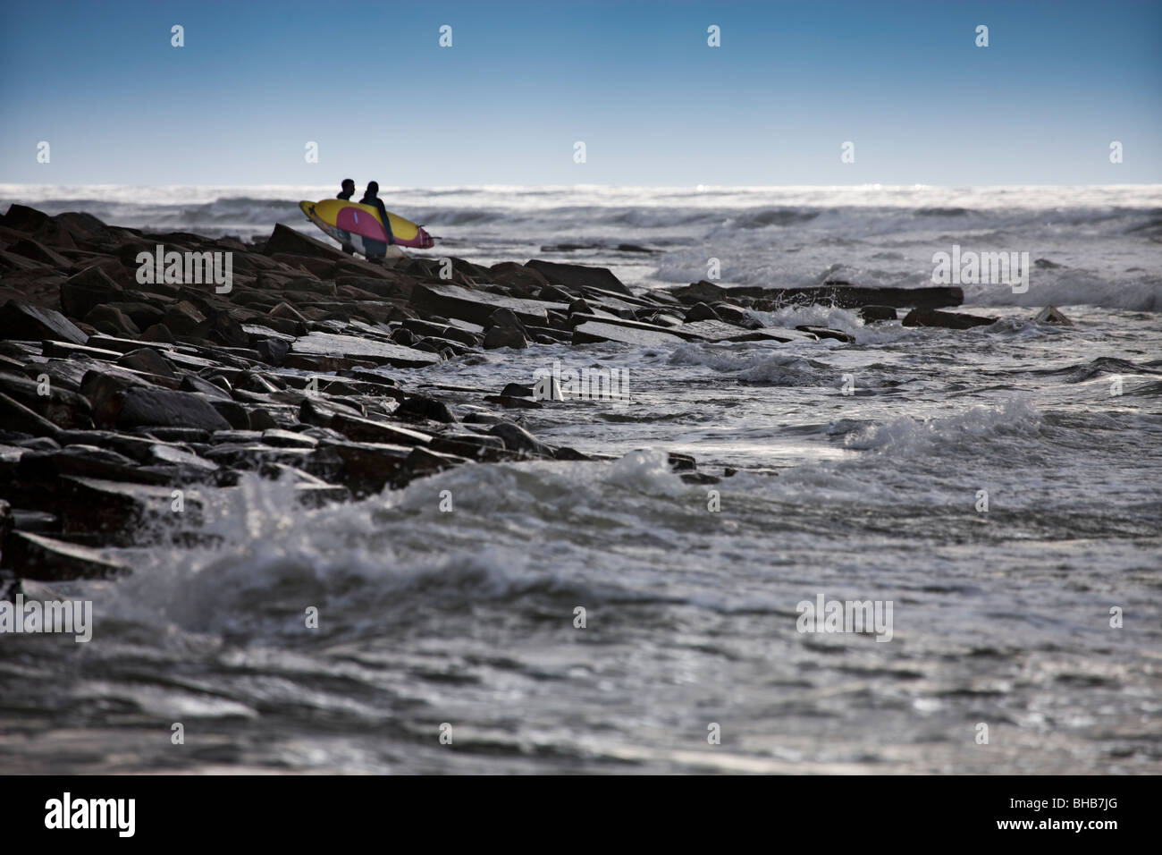 Surfers at Kimmeridge on the Dorset Jurassic Coast Stock Photo - Alamy