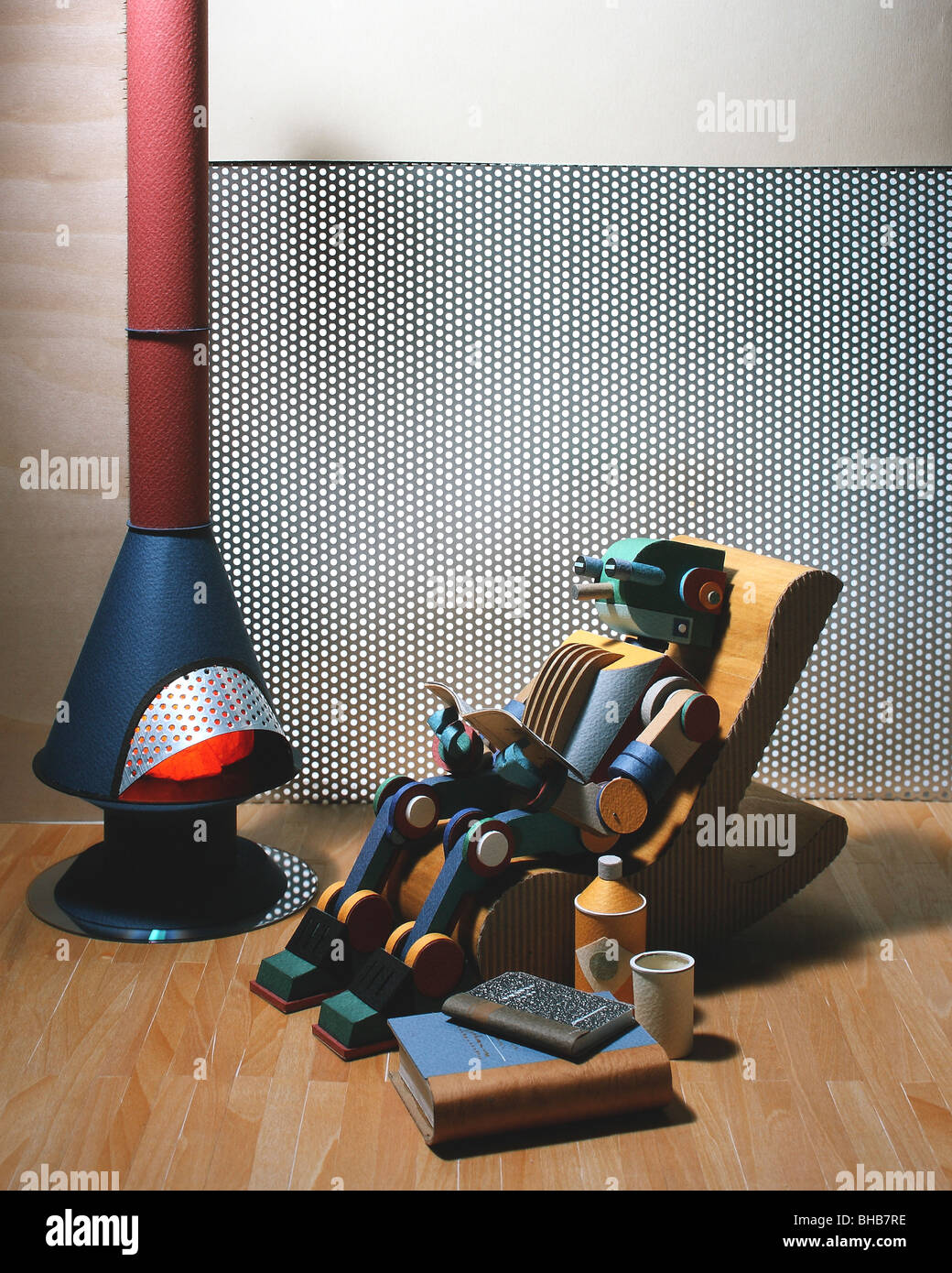 Robot sitting on chair, reading book Stock Photo - Alamy