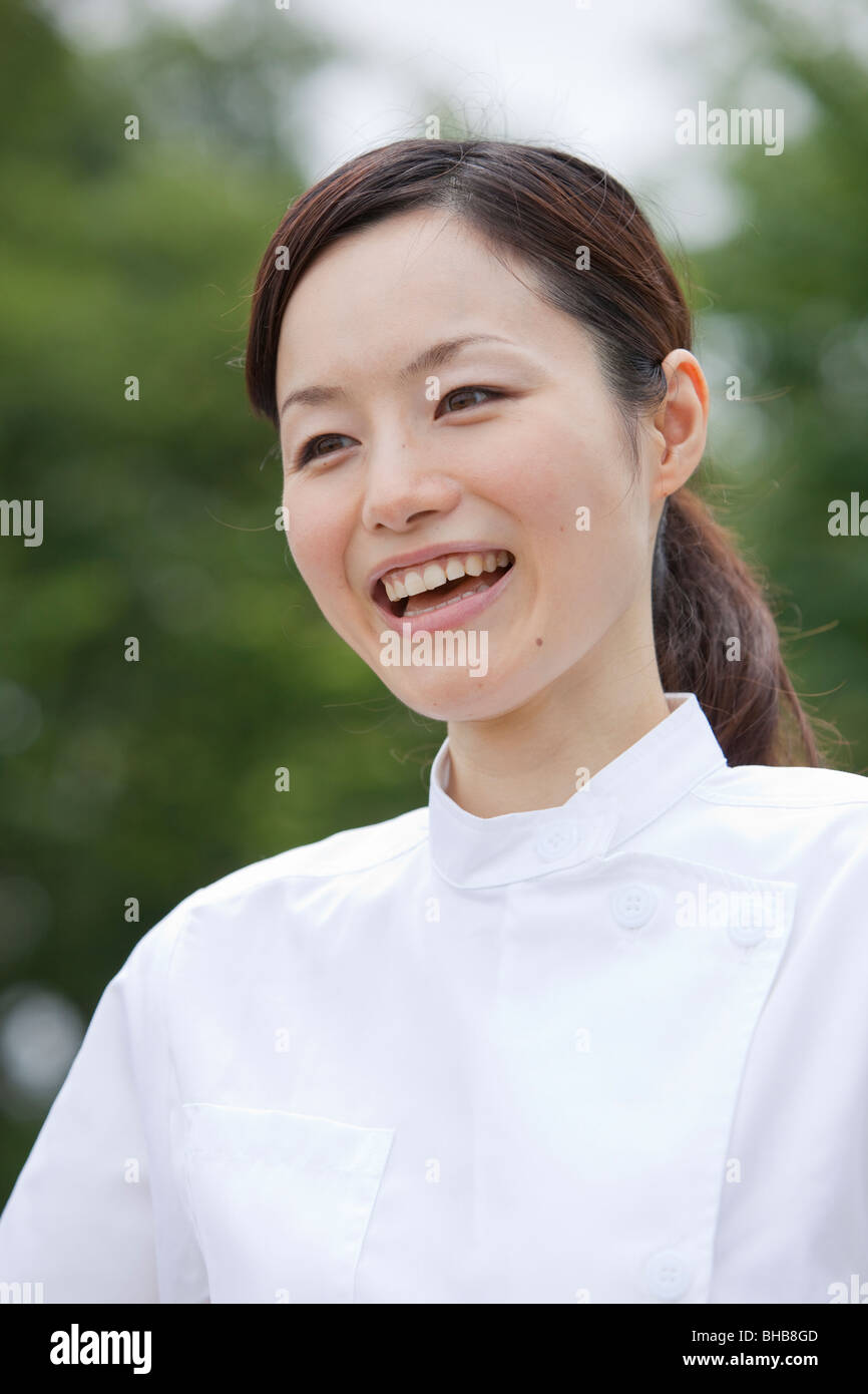 Japan, Tokyo Prefecture, Female nurse smiling, close-up Stock Photo - Alamy