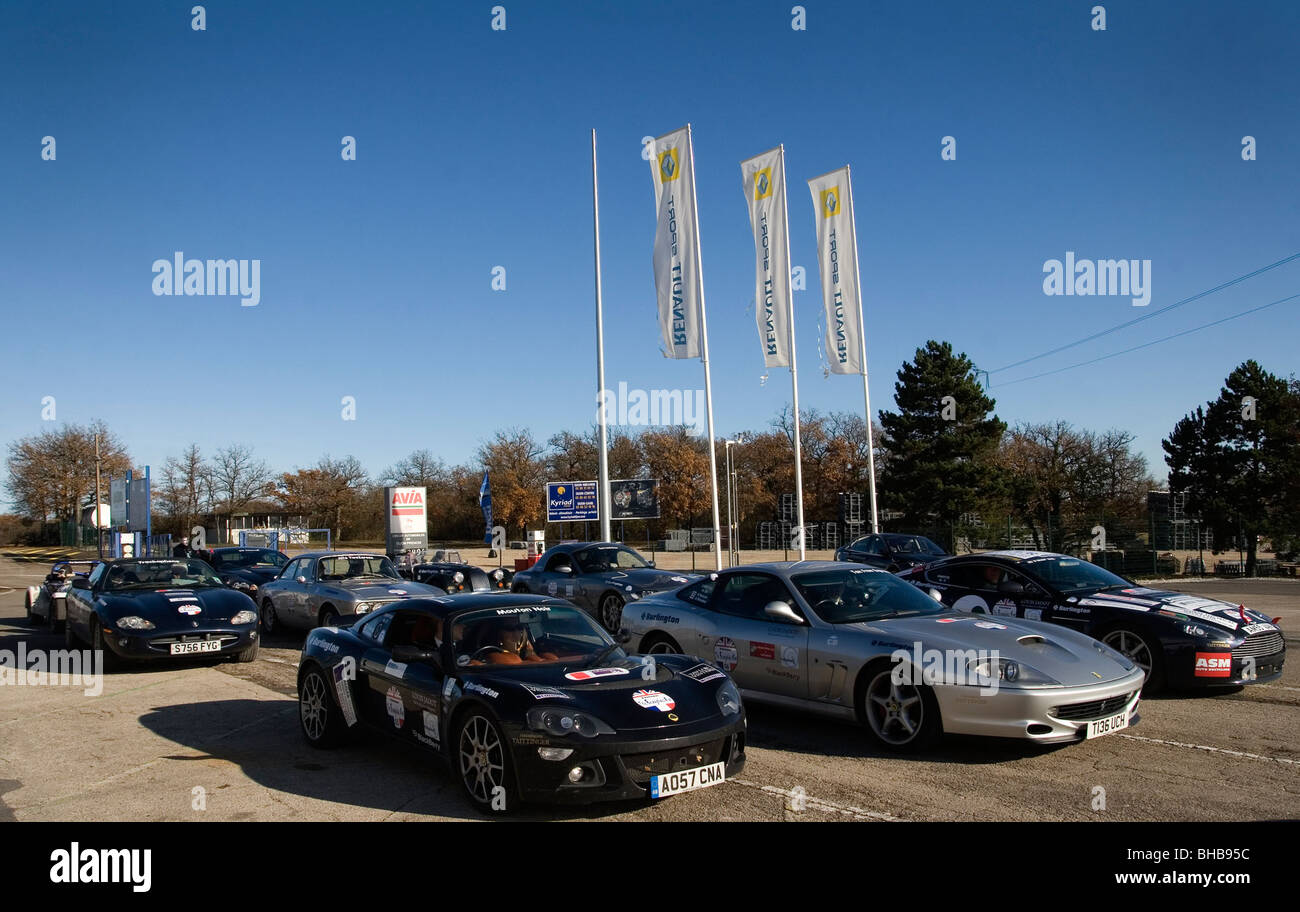 Members of the 2009 Beaujolais Run arrive at the Dijon Race Track in ...