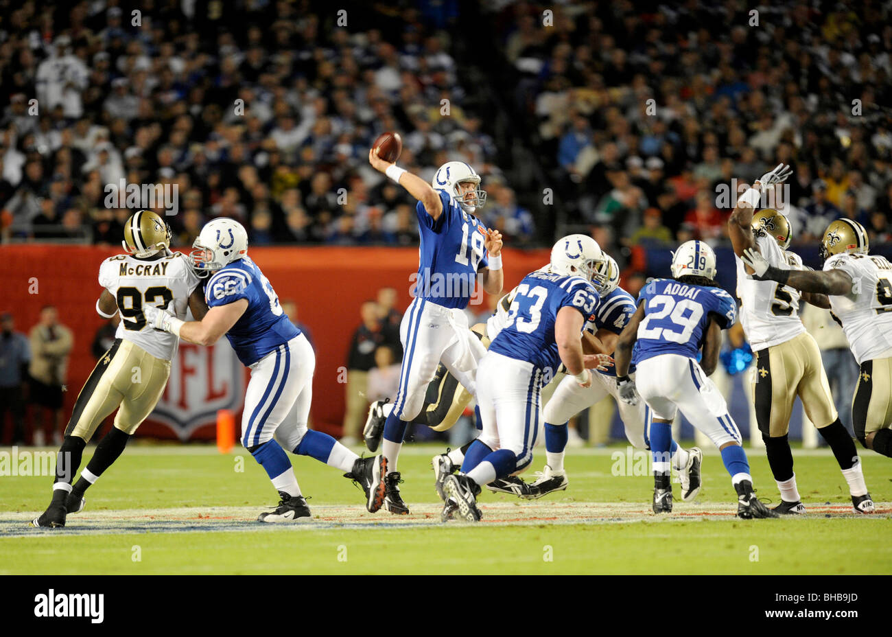 Peyton Manning #18 of the Indianapolis Colts drops back to pass against ...