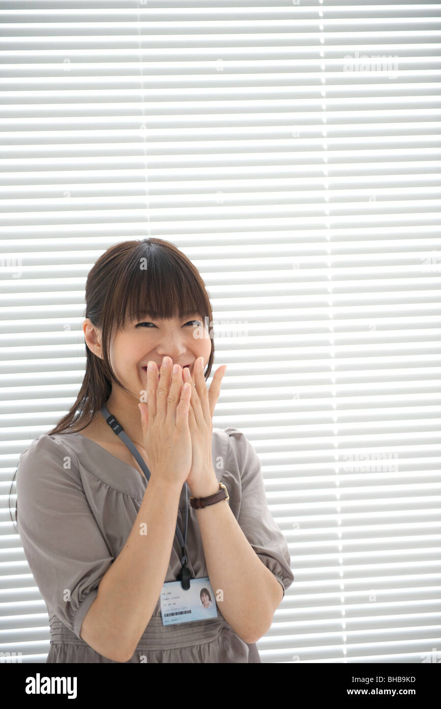 Japan, Osaka Prefecture, Businesswoman smiling, portrait Stock Photo ...
