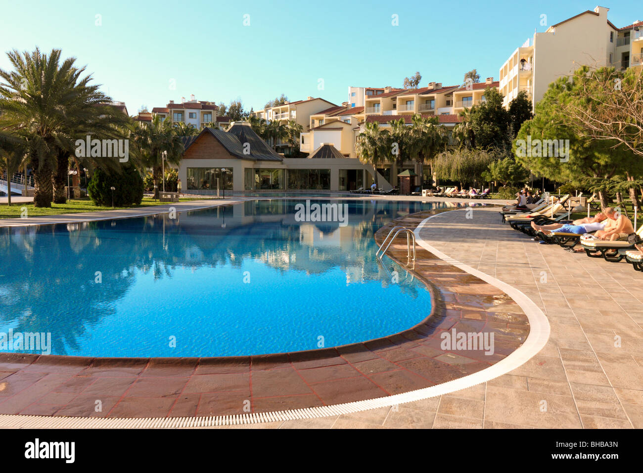 Hotel with Swimming Pool in Side Stock Photo - Alamy