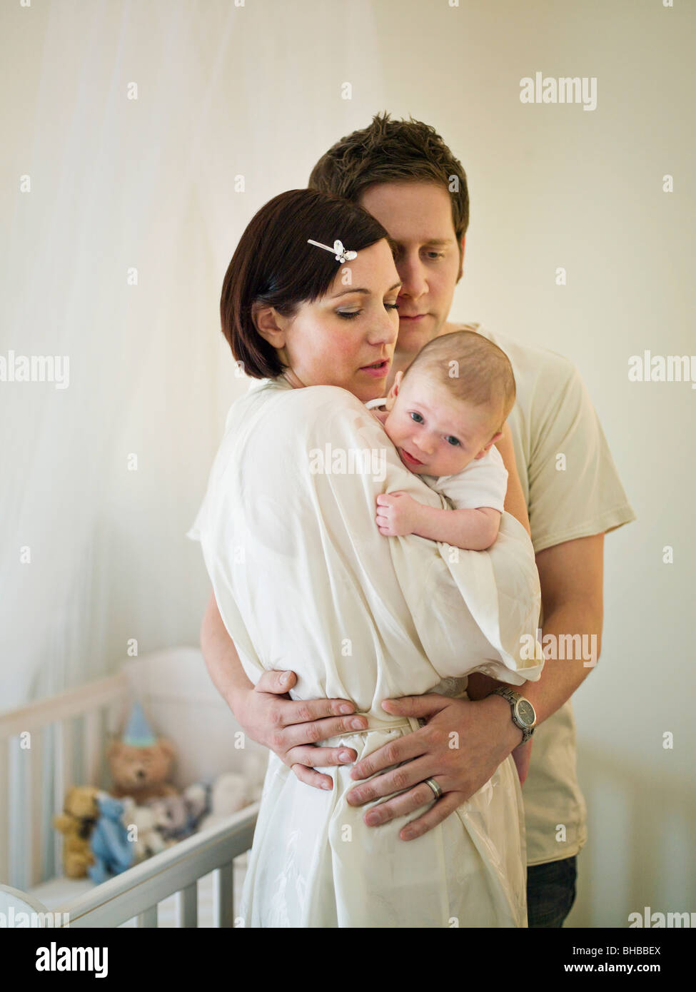 A mother holding a new born baby Stock Photo - Alamy