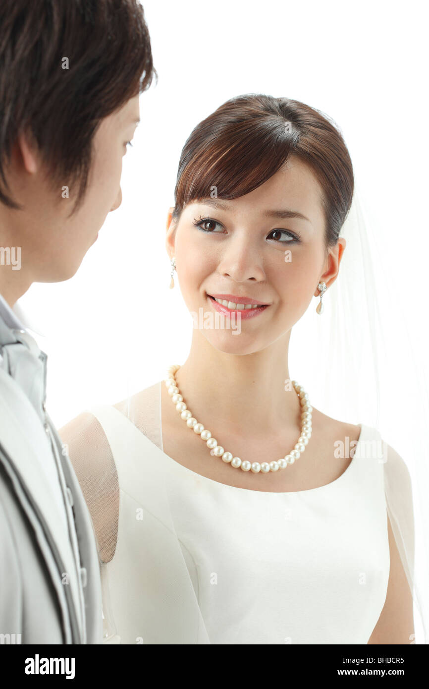 bride and groom looking at each other Stock Photo - Alamy