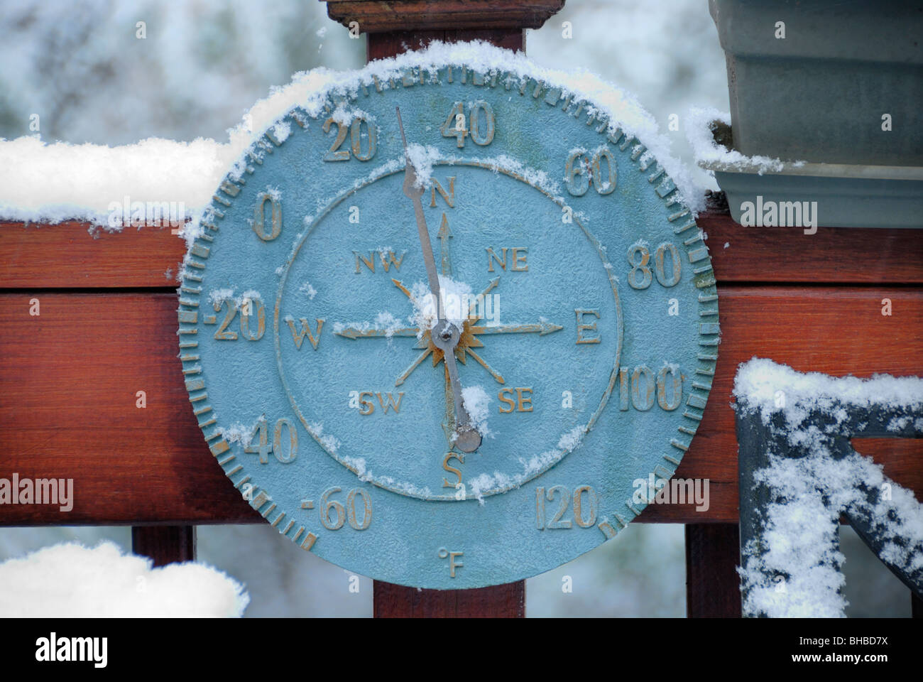 Outdoor thermometer covered with fresh snow Stock Photo - Alamy