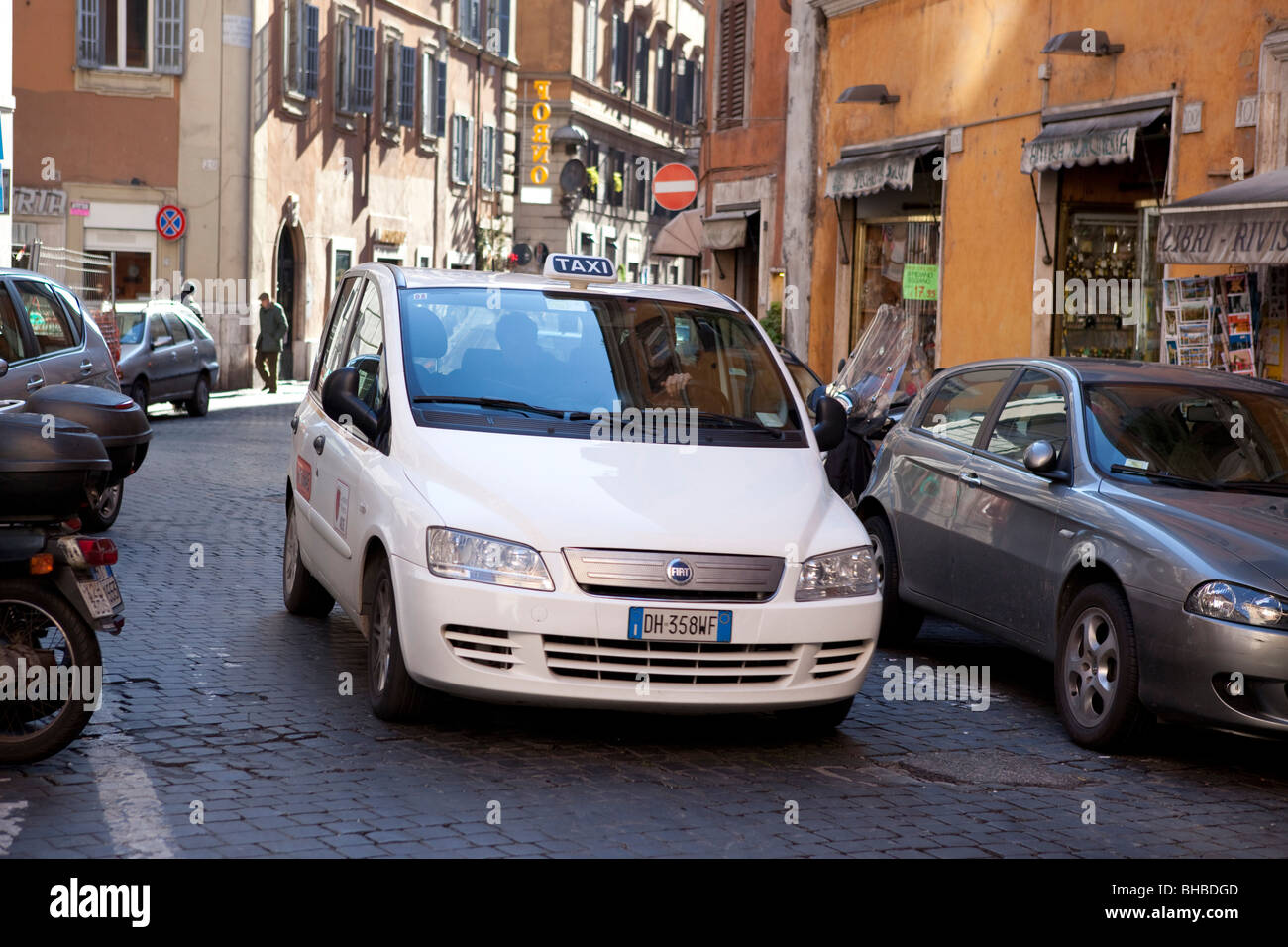 taxi driving in street Rome Italy Stock Photo - Alamy