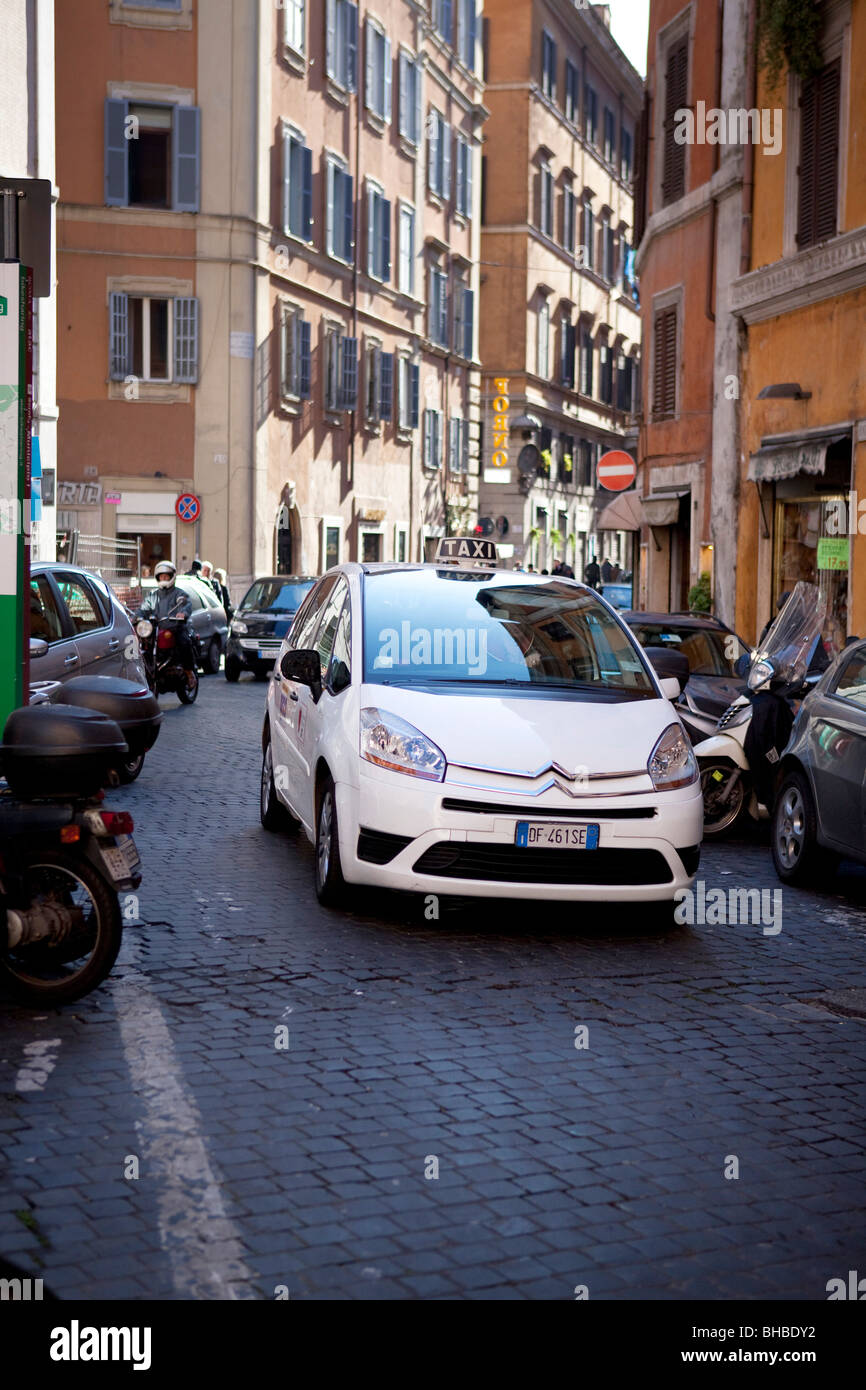 taxi driving in street Rome Italy Stock Photo - Alamy