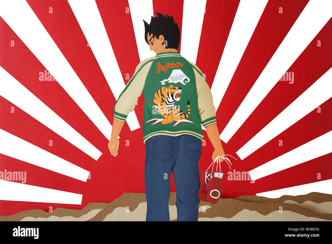 Man holding boxing gloves, sun in background, rear view Stock Photo - Alamy