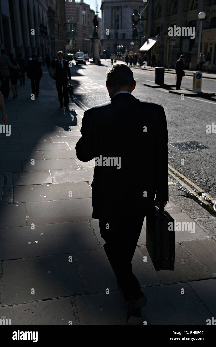 a banker walking in the city of london Stock Photo - Alamy