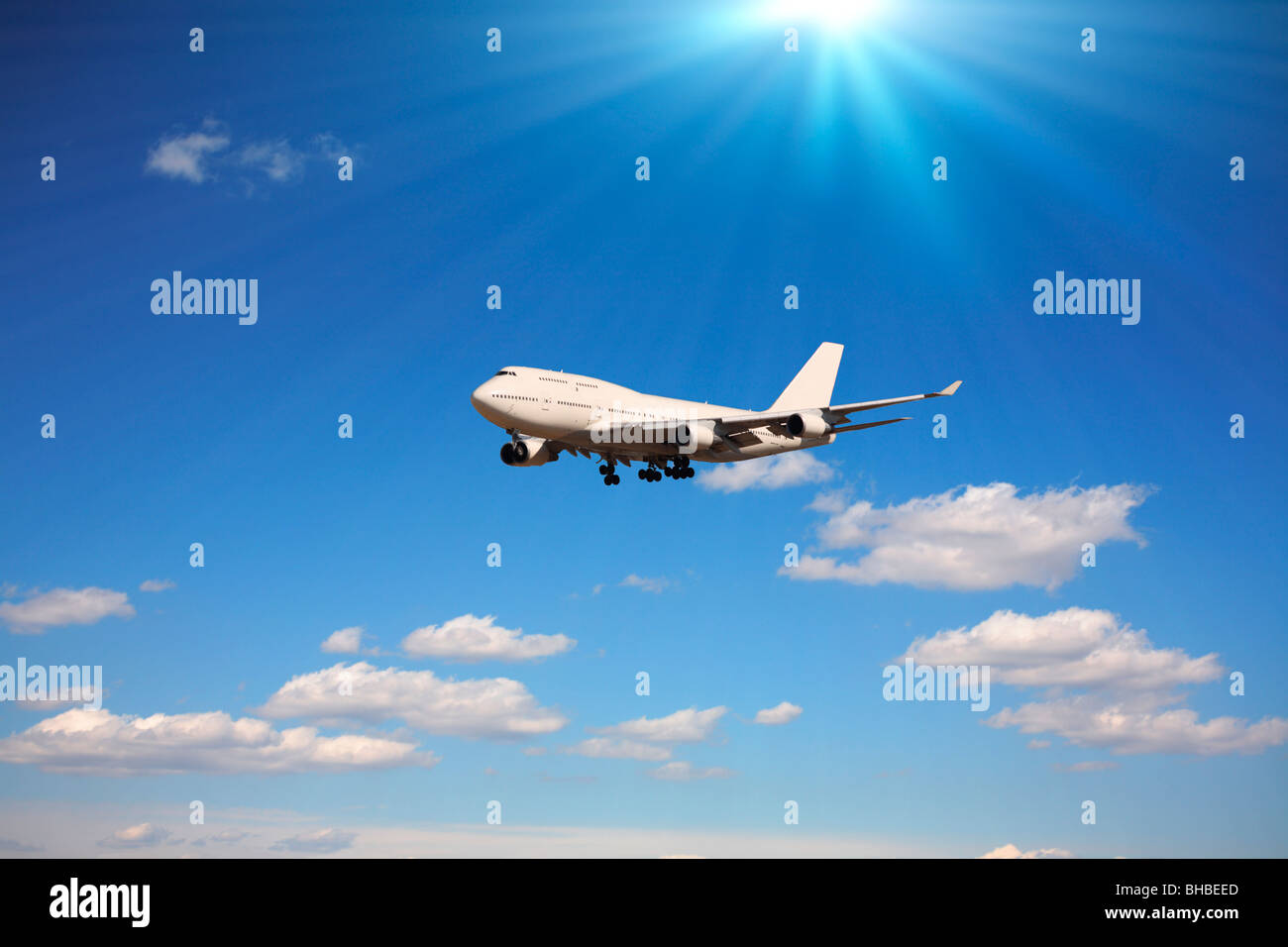 Commercial airplane in flight, low angle view Stock Photo - Alamy