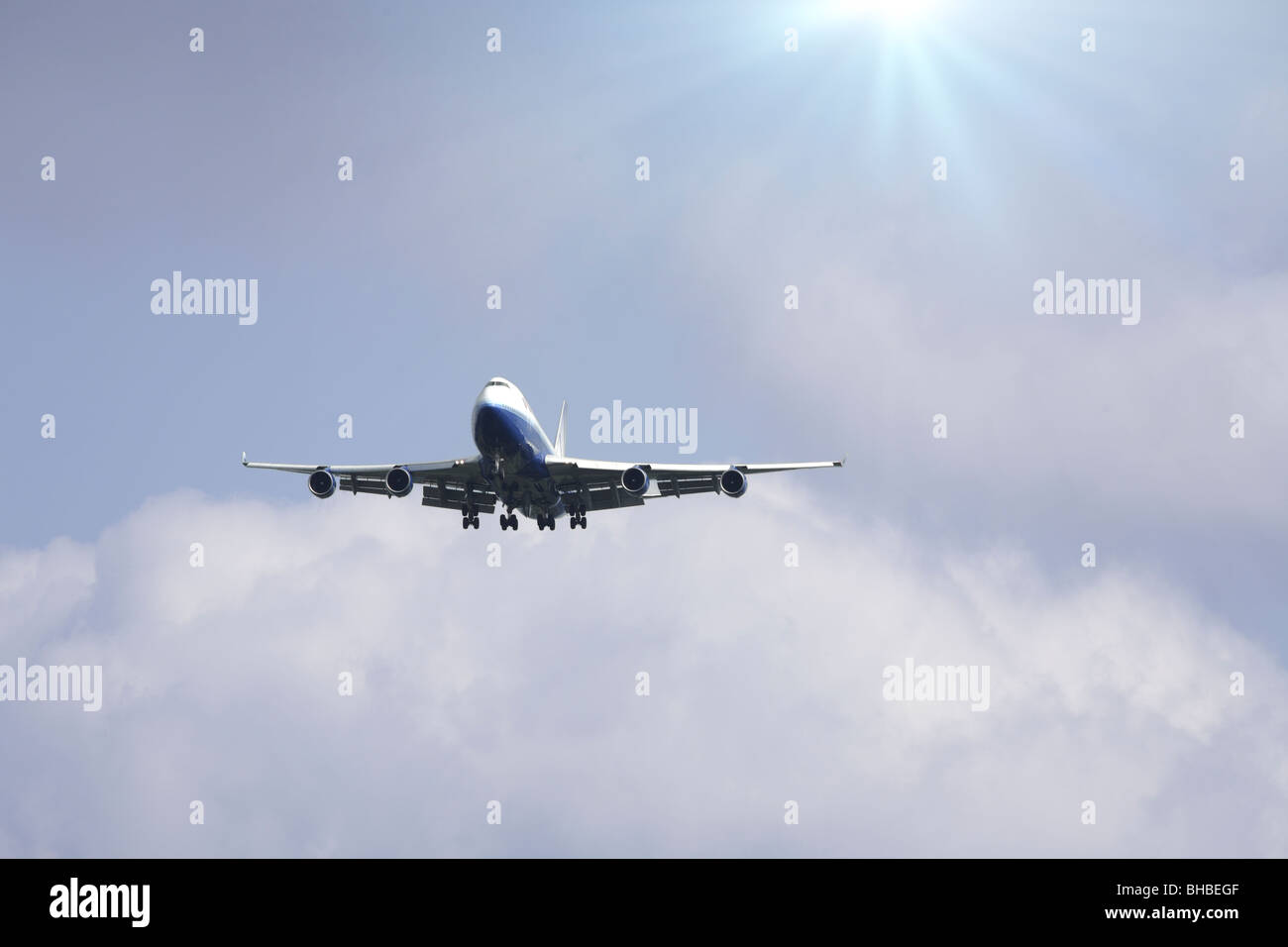 Commercial airplane in flight, low angle view Stock Photo - Alamy
