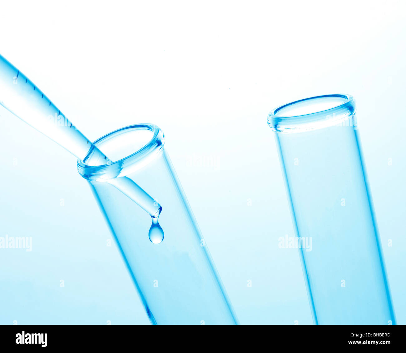 Drop falling from pipette into test tube, close up Stock Photo - Alamy