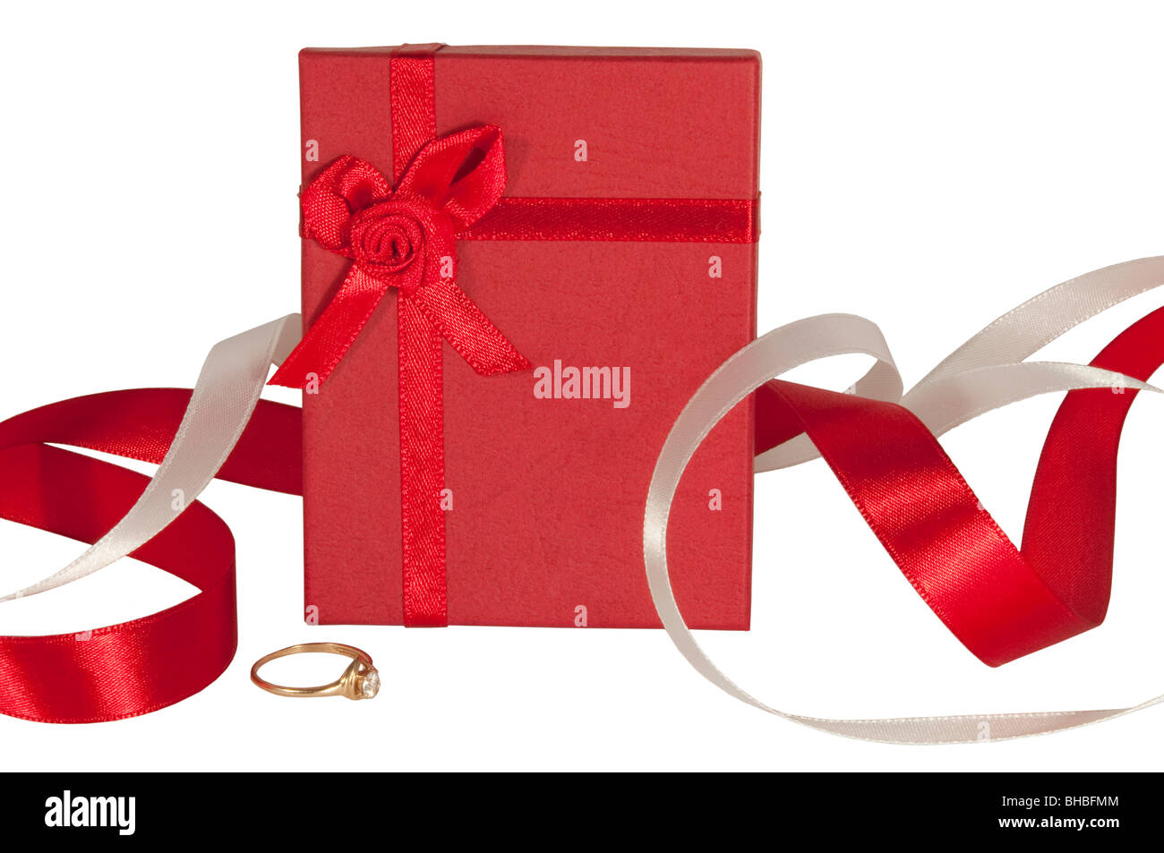 Gift box with ribbons isolated on white Stock Photo - Alamy