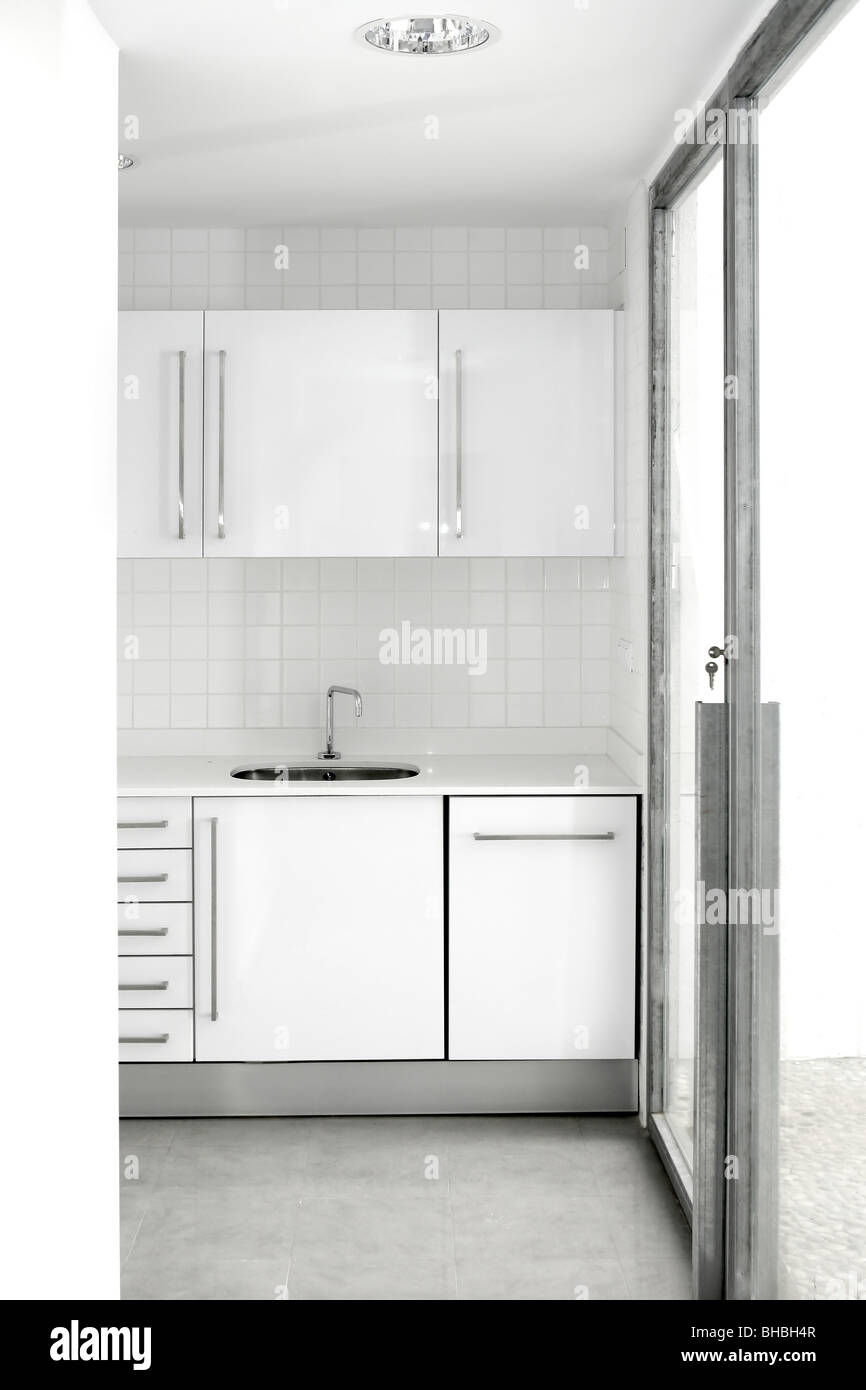 House white kitchen modern simple glass door Stock Photo - Alamy