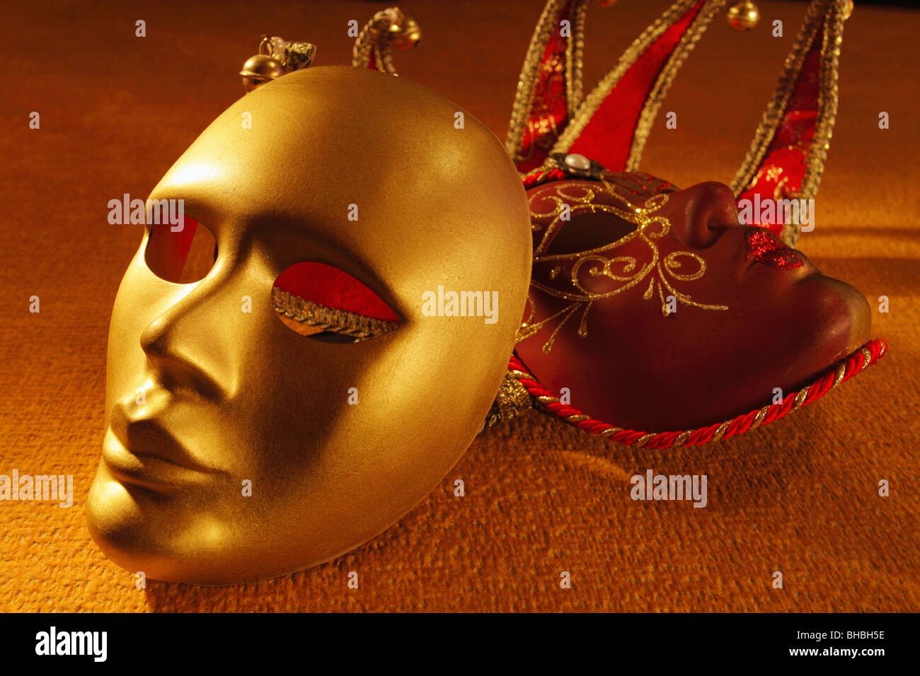 venetian masks on a textile Stock Photo - Alamy