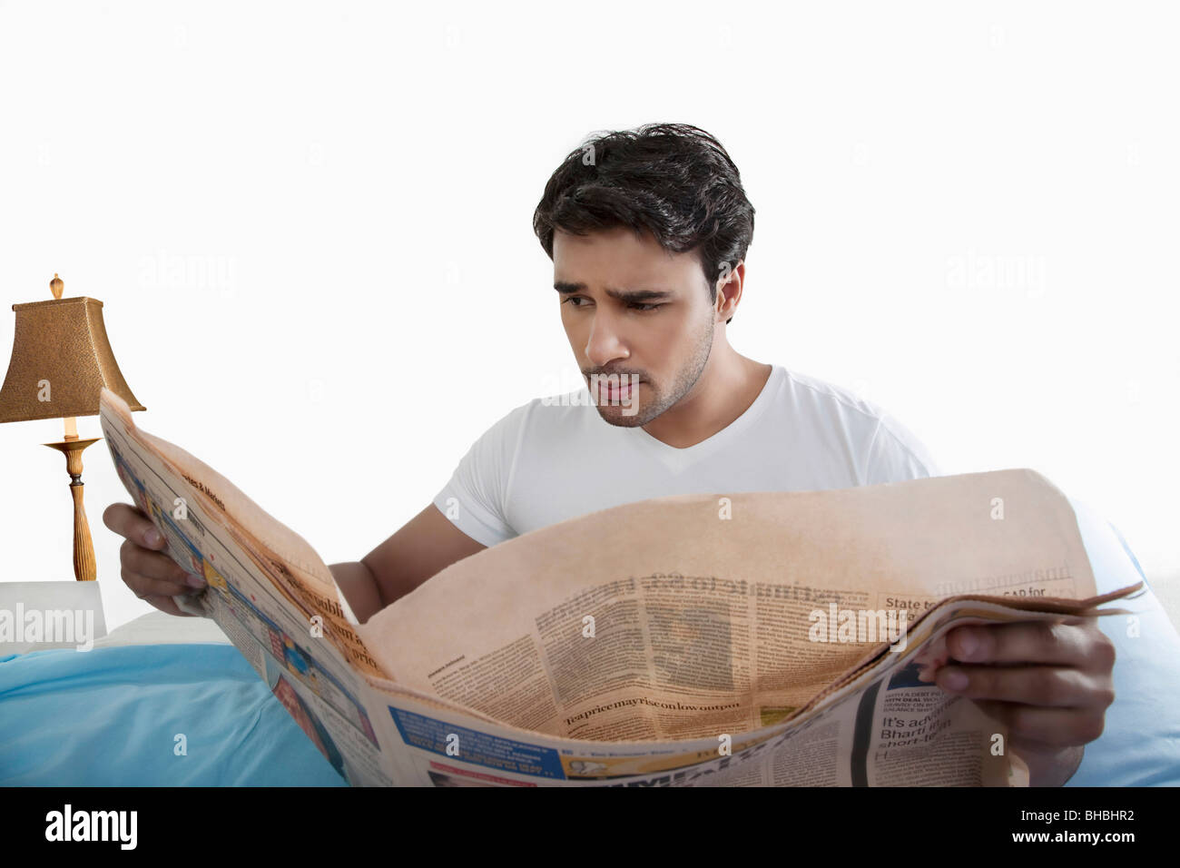 Man reading a newspaper Stock Photo - Alamy