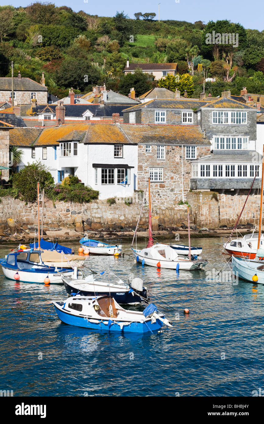 Cottages on the harbourfront in the old fishing village of Mousehole ...