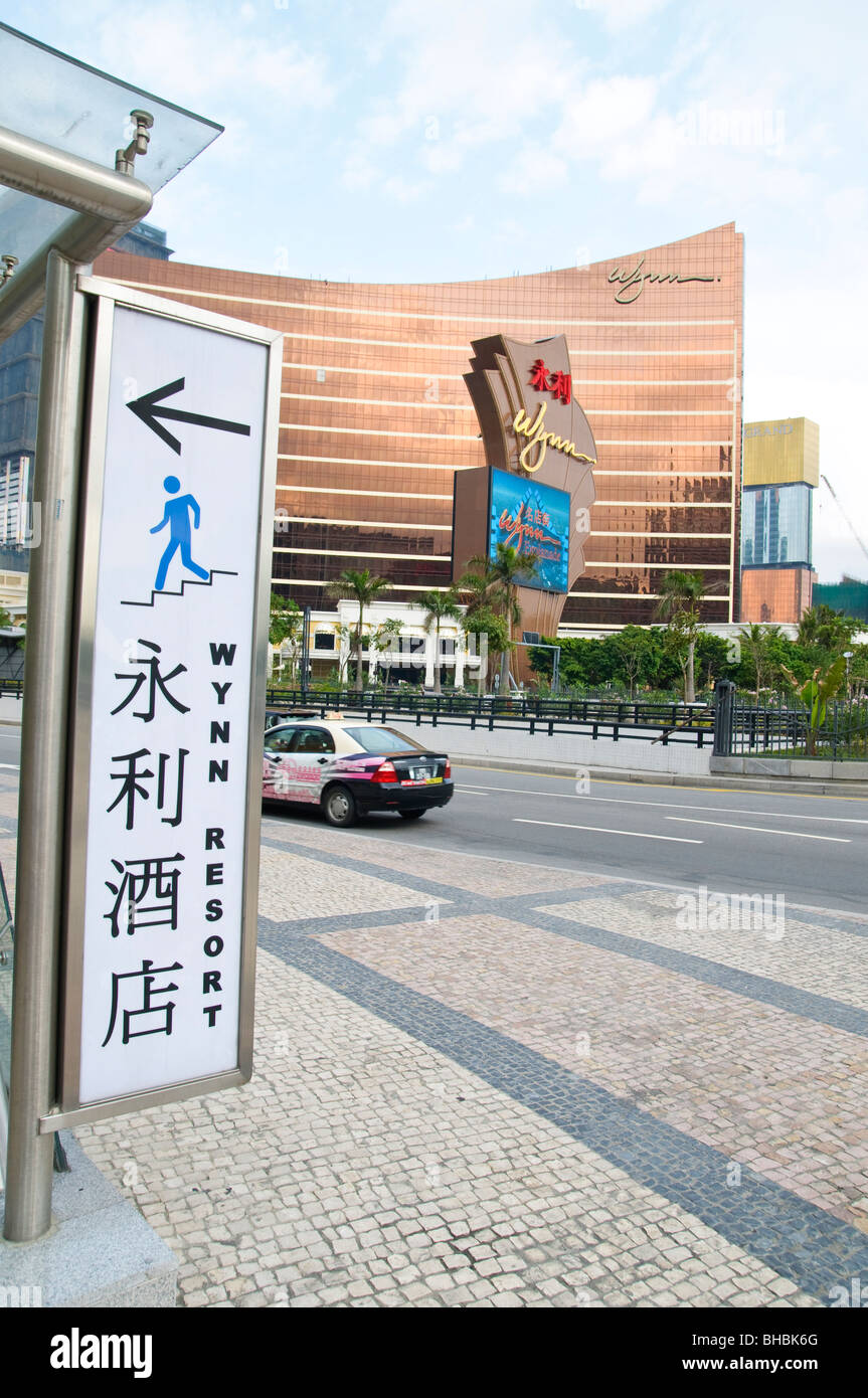 A sign showing passers-by the way to the Wynn Casino Hotel, with the ...