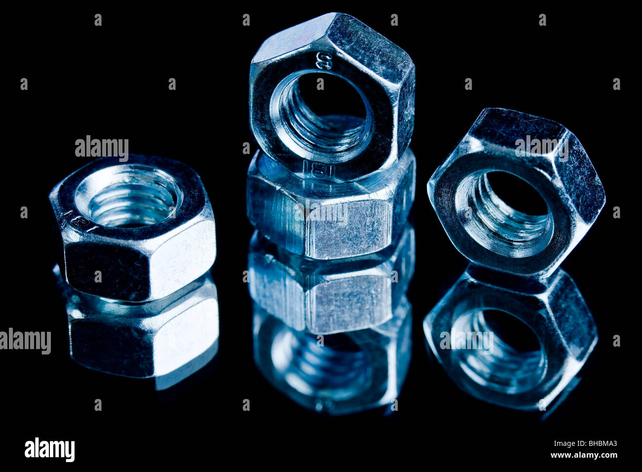Close up of nuts on black background Stock Photo - Alamy