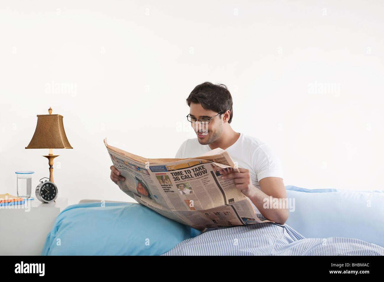 Indians reading newspaper hi-res stock photography and images - Alamy