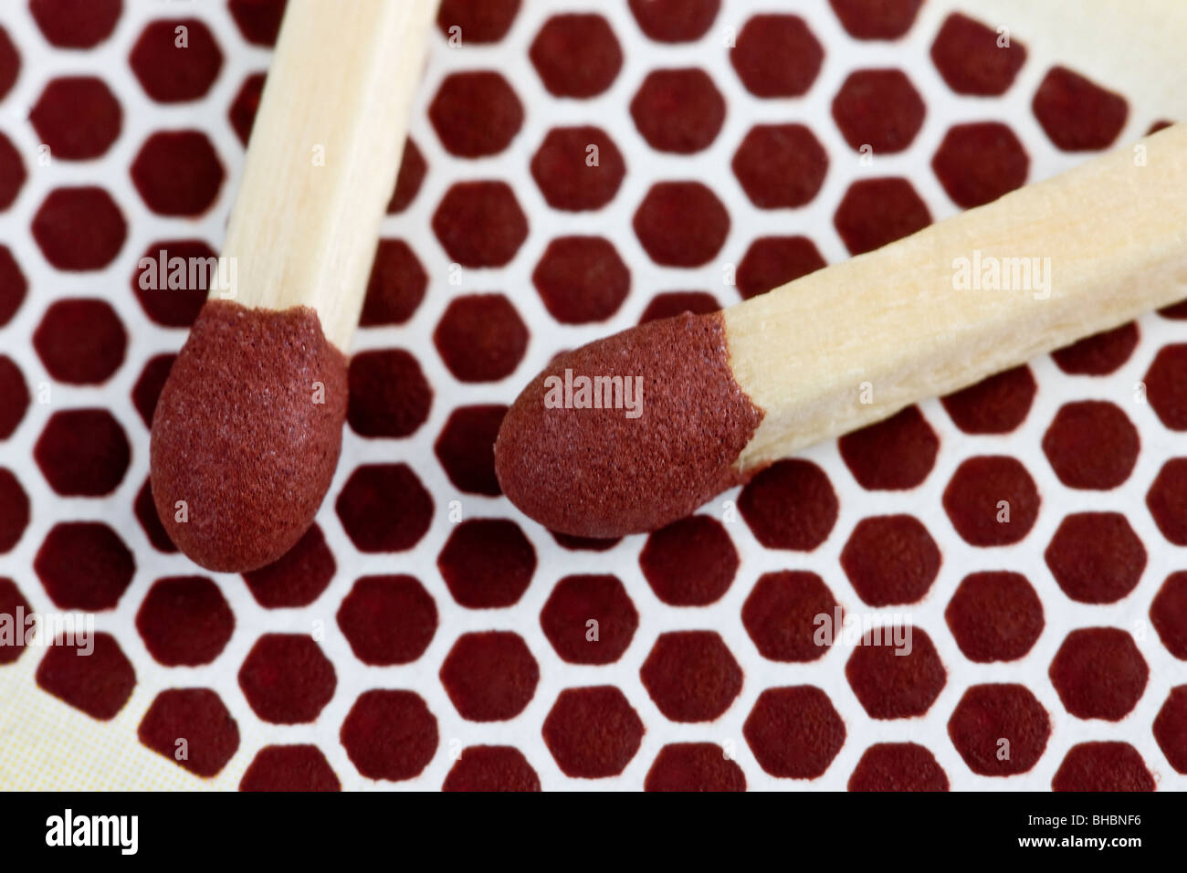 Two matchsticks on the striking surface of a matchbox Stock Photo - Alamy