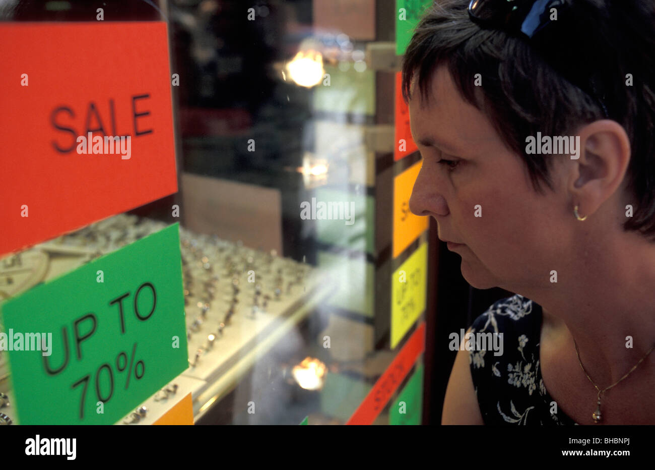 Woman window shopping temptation window hi-res stock photography and ...