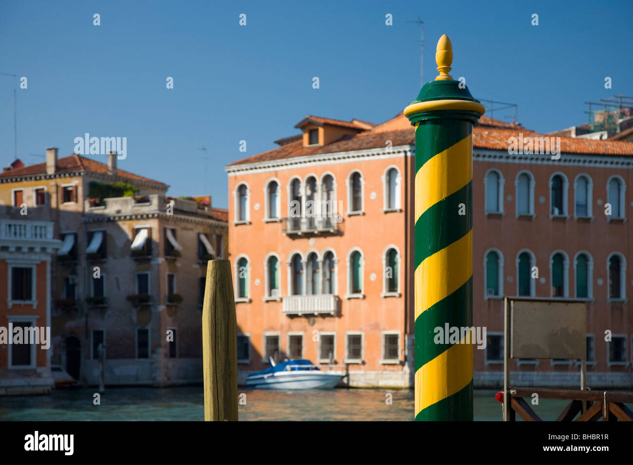 Venice, Veneto, Italy. Typical striped mooring post on the Grand Canal ...