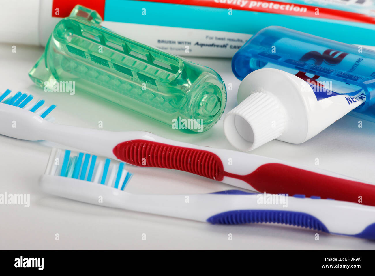 Toothpaste tooth paste tube with squeezer dispenser a toothbrush ...