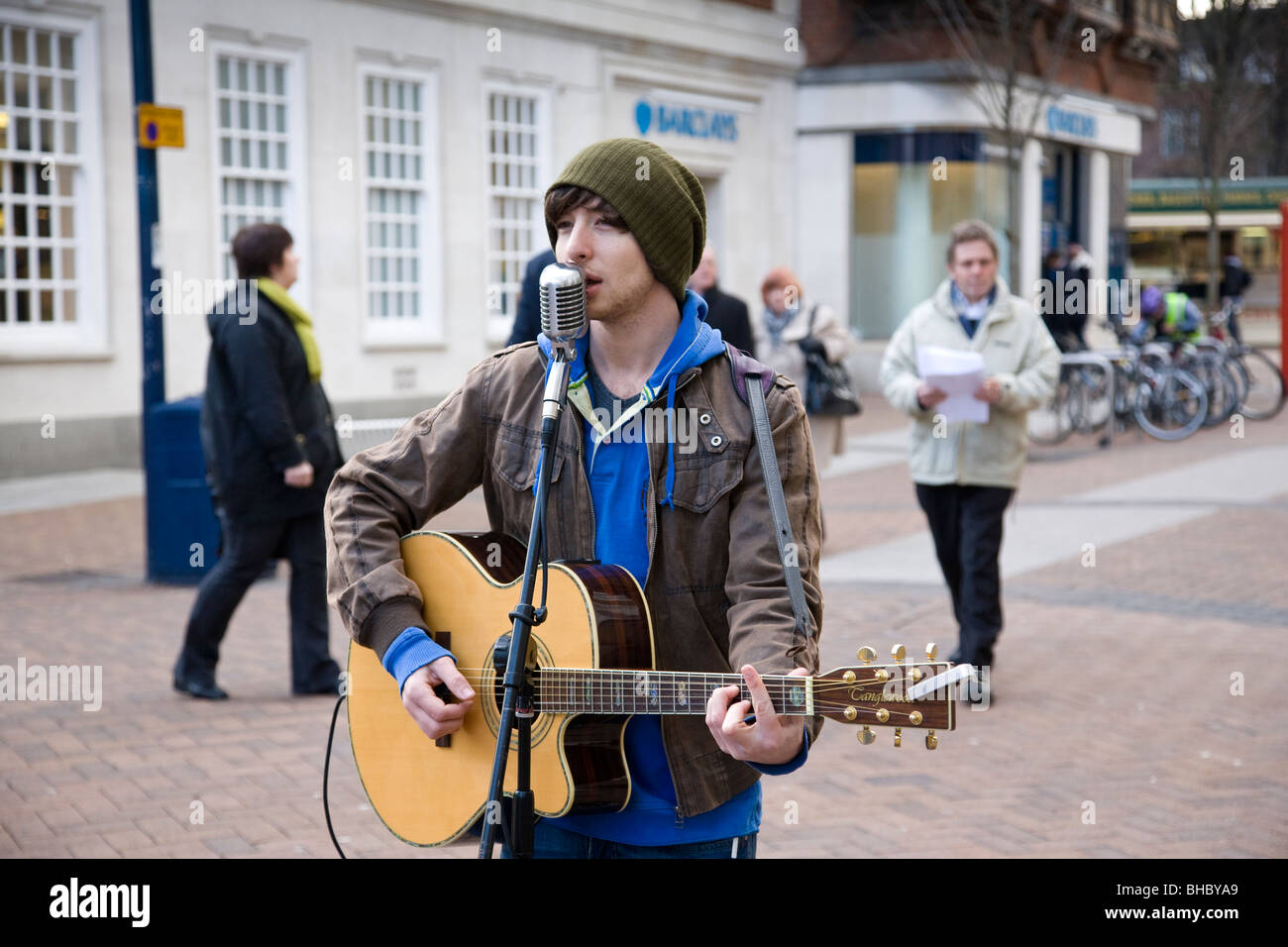 Street musician performing in Kingston, Surrey, England Stock Photo - Alamy