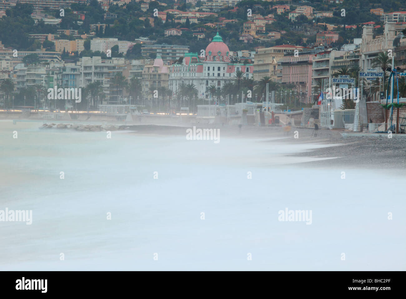 The beach of Nice pictured in early morning Stock Photo - Alamy